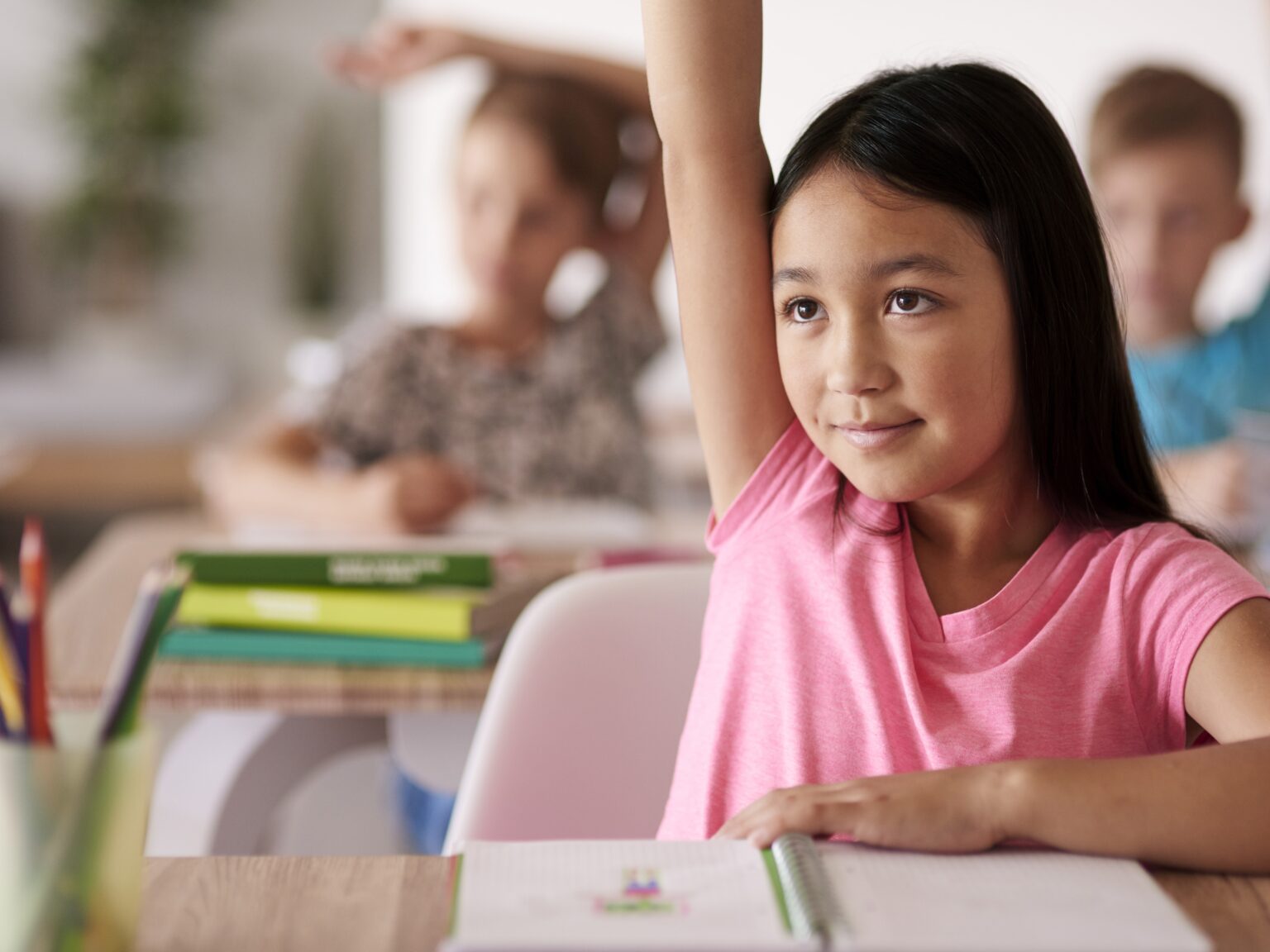 Girl raising her hand - Food Research & Action Center